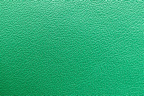 질감이 있는 녹색 표면은 배경이나 창의적인 프로젝트에 적합한 생생하고 독특한 디자인을 보여줍니다 0명에 대한 스톡 사진 및 기타