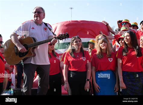 Welsh Singer Dafydd Iwan Performs With A Choir At The Corniche Walk