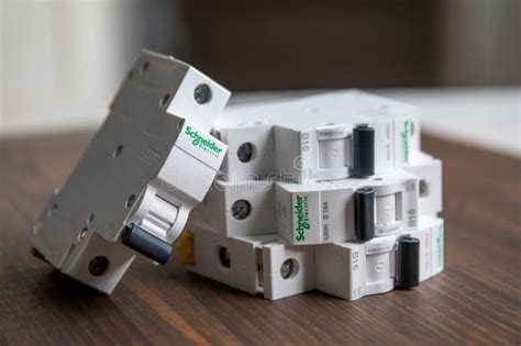 Schneider Electric Electric Relay And Automatic Machines On A Wooden Background Editorial Image