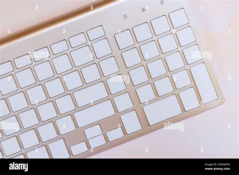 There Are Blank Buttons On Clear Computer Keyboard Which Is White