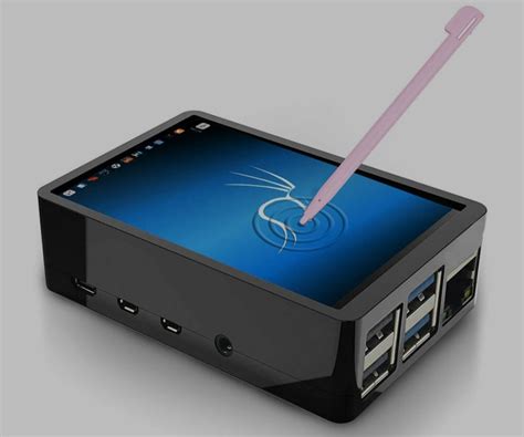 A Raspberry Pi Like Device With A Smartphone Screen The Kali Linux Logo As A Background With