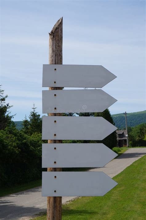 Wooden Signpost With Five Arrows Stock Photo Image Of Wooden White