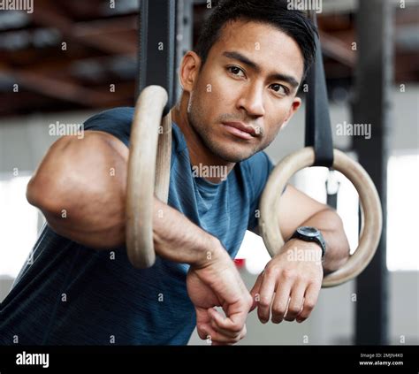 Thinking Gymnastic Rings And Olympics With A Man Gymnast Hanging On