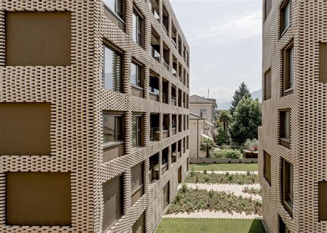 Brick Pixel Patchwork Envelops Housing By Buzzi Studio Di Architettura