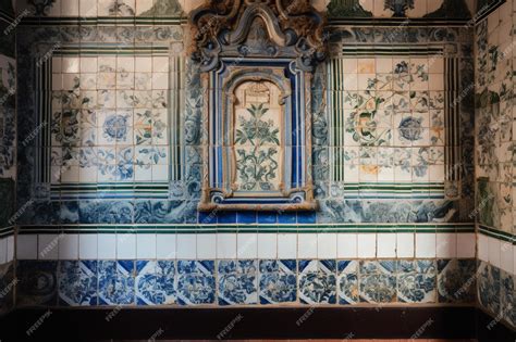Premium Ai Image A Wall With Blue And White Tiles And A Picture Of A
