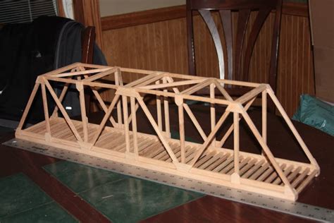A Wooden Structure Sitting On Top Of A Table