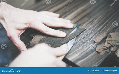 The Process Of Cutting A Leather With A Knife Stock Image Image Of