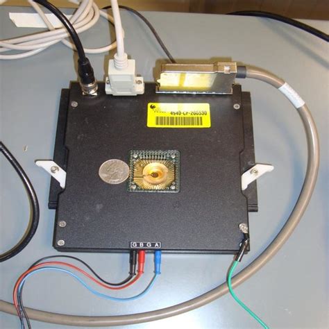 An Image Showing A Microelectrode Array Mea Mounted On An