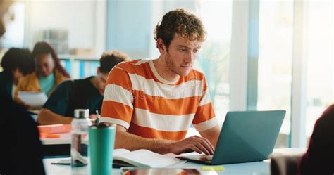 Laptop College And Typing With Man In Classroom For Software Bootcamp