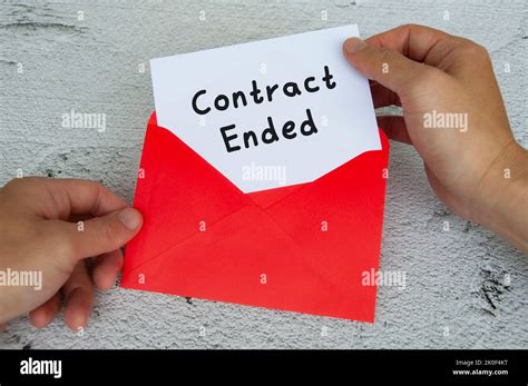 Contract Ended Text On White Notepad With Red Envelope Background Employment Concept Stock