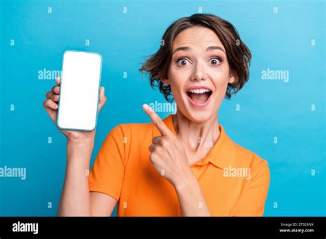 Photo Of Adorable Excited Lady Wear Orange T Shirt Open Mouth Showing