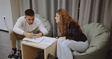 Students Study Geometry After Class With Professor Beanbag Chairs