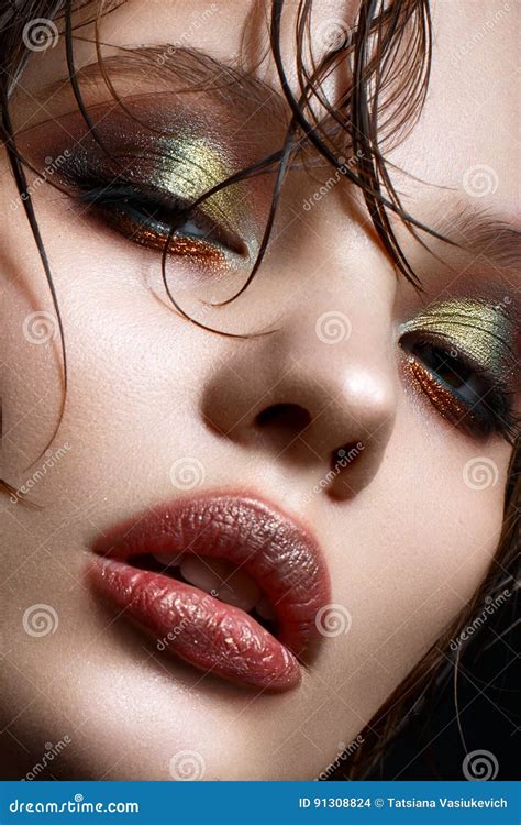 A Young Girl With Bright Creative Makeup And Perfect Skin Beautiful