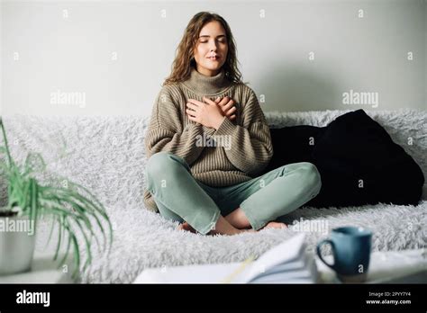 Relaxation Techniques Woman Practicing Pranayama In Lotus Position On