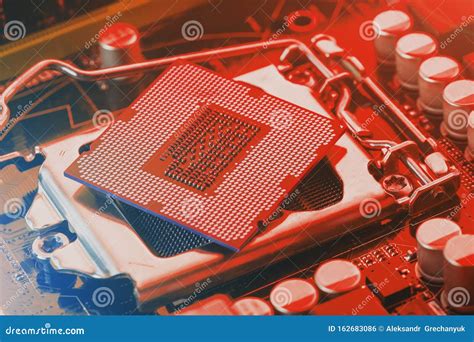 The Central Processor On The Computer Motherboard In Red Colors Stock Photo Image Of Equipment