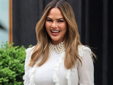 Chrissy Teigen Shares Topless Video Following Breast Implant Removal Surgery