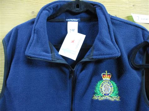 2x The Bid Price Large Mens Ladies Rcmp Vests Bodnarus Auctioneering