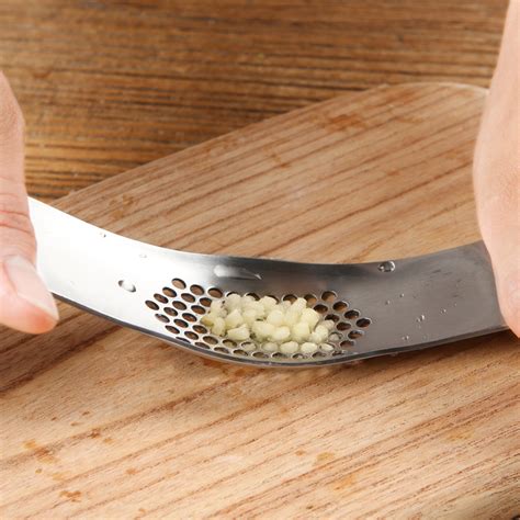 การออกแบบที่คล่องตัวสแตนเลสกระเทียม Presser อุปกรณ์ครัว Jiyue Thaipick