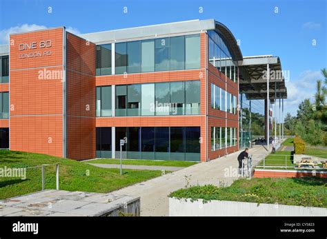 Modern Office Building With Glass Cladding To Main Elevation Located