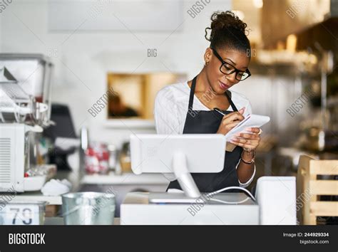Shop Assistant Taking Image And Photo Free Trial Bigstock