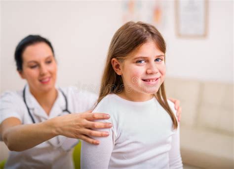 Chiropractor Doing Adjustment On Female Patient Stock Image Image Of
