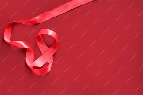 Premium Photo Ribbon On Red Background
