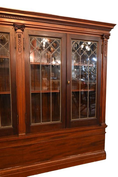 Mahogany Leaded Glass Door Enclosed Bookcase With Carved Details