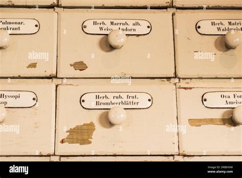 Antique Pharmacy Glasses And Medicine Cabinet Stock Photo Alamy