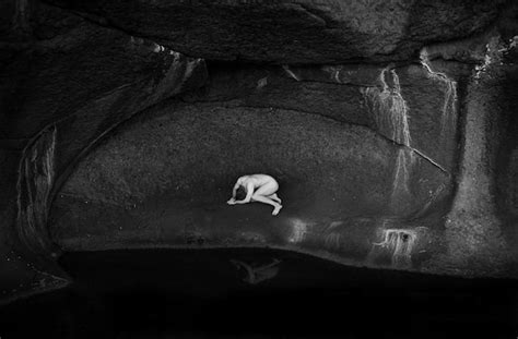 Premium Photo Naked Man Lying Down In Cave