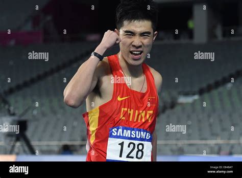 Incheon South Korea 30th Sep 2014 Xie Wenjun Of China Celebrates After The Mens 110m