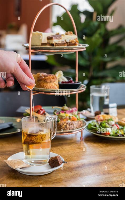 Traditional English Afternoon High Tea With A Mixture Of Sweet And