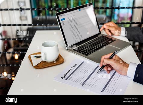 Business Man Filling Out Application Form Concept Stock Photo Alamy