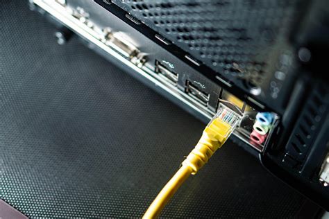 Yellow Ethernet Cable Connected To Computer Stock Photo At Vecteezy