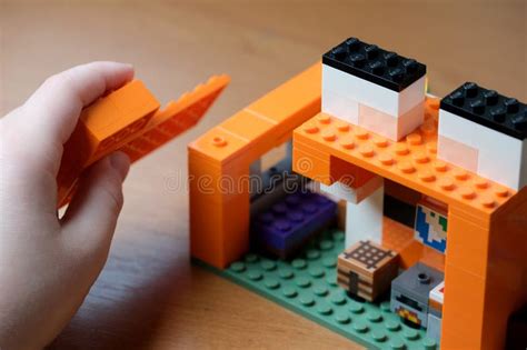 Building A Colorful Lego Structure With Creativity And Imagination