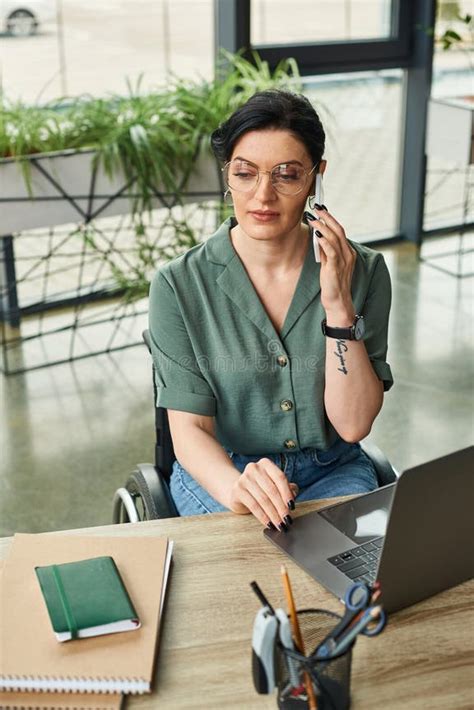 Attractive Businesswoman With Disability With Glasses Stock Image