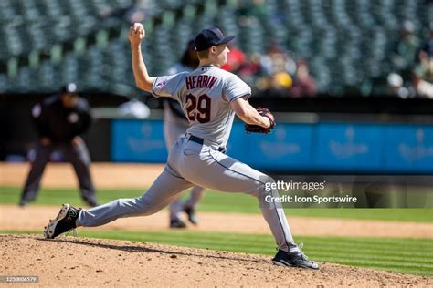 Cleveland Guardians Pitcher Tim Herrin Throws A Pitch During The Mlb