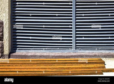 Big Ventilation Grille On Gray Wall Grille Is Made Of Metal With Grid