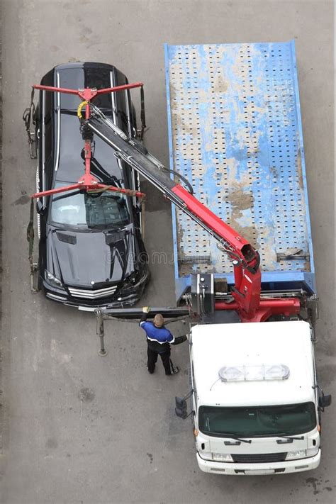 Tow Truck Is Getting Crashed Black Car On The Stock Image Image Of