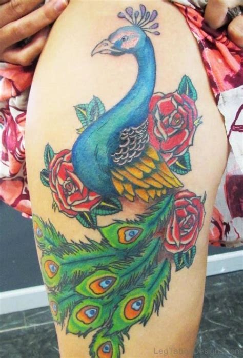 49 Stunning Peacock Tattoos On Thigh Leg Tattoo Designs