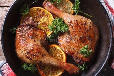Roasted Duck Legs In A Pan With Oranges Top View Horizontal Stock Image