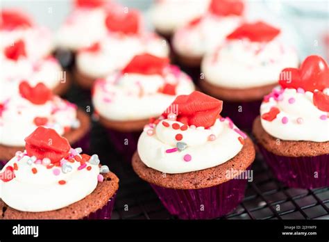 Red Velvet Cupcakes With Cream Cheese Frosting And Decorates With Heart