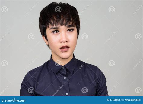 Face Of Stressed Young Androgynous Asian Transgender Woman Stock Image