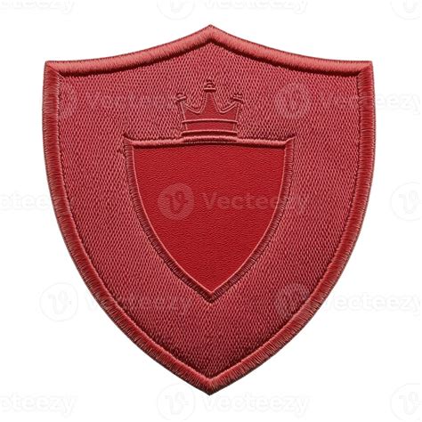 A Red Embroidered Shield Patch With Crown Design Symbolizes Protection