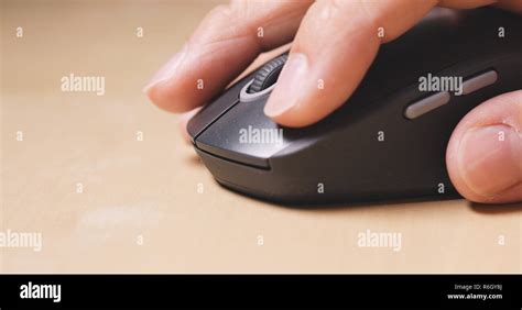 Man Uses A Computer Mouse Stock Photo Alamy