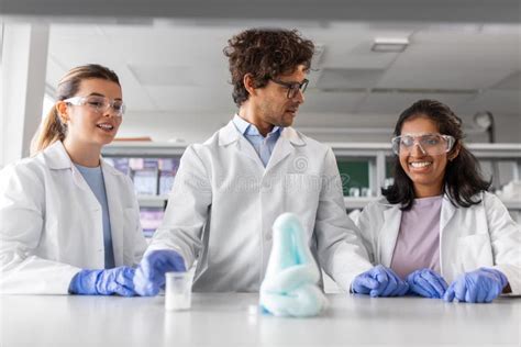 Scientists With Chemicals Working In Laboratory Stock Image Image Of Female Goggles 254269029