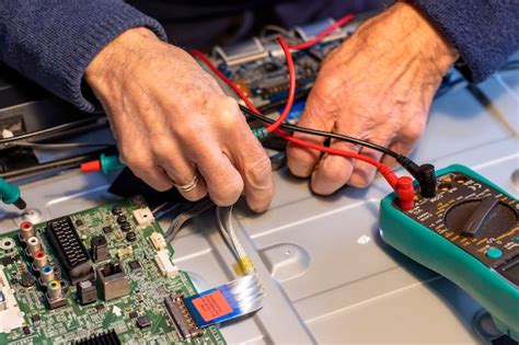 Premium Photo Senior Electronics Technician Working In The Field Of Electronics