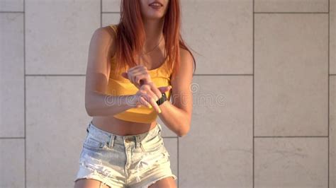 Young Woman Dancing On The Street Slow Motion Attractive Redhead