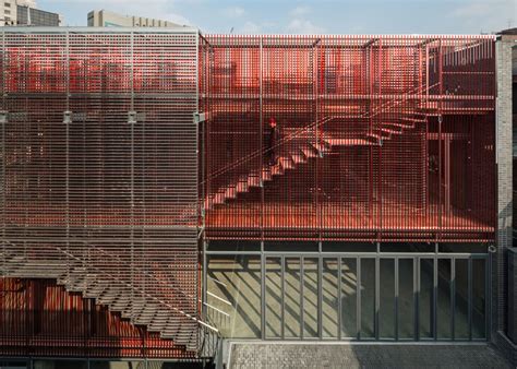 Red Mirrored Lattice Encloses Office Block By Wise Architecture