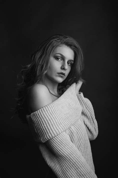 Splendid Young Woman With Long Curly Hair With Bare Shoulders Stock