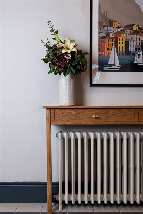 Grey Console Table Over Radiator At Ross Katherine Blog